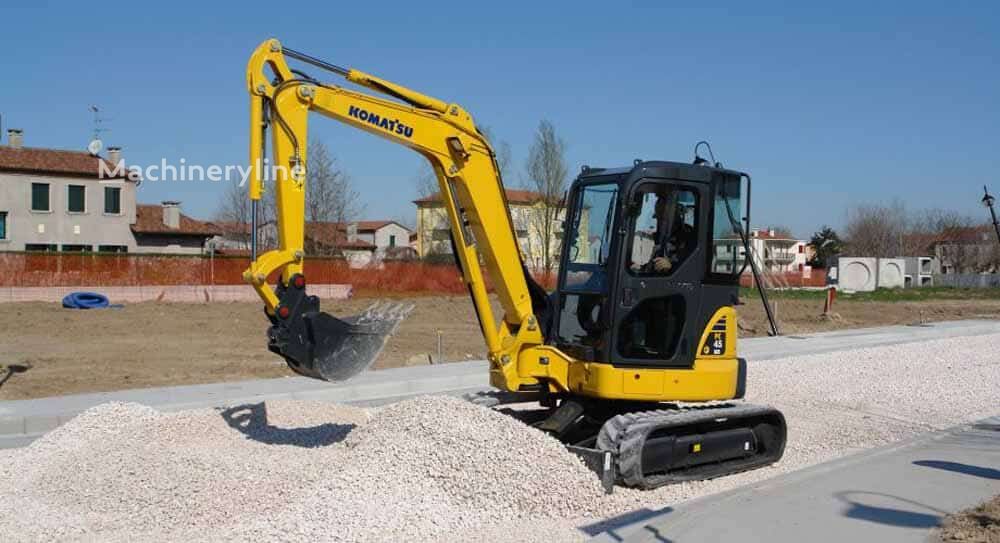Komatsu în funcțiune pe șantier hidraulični čekić