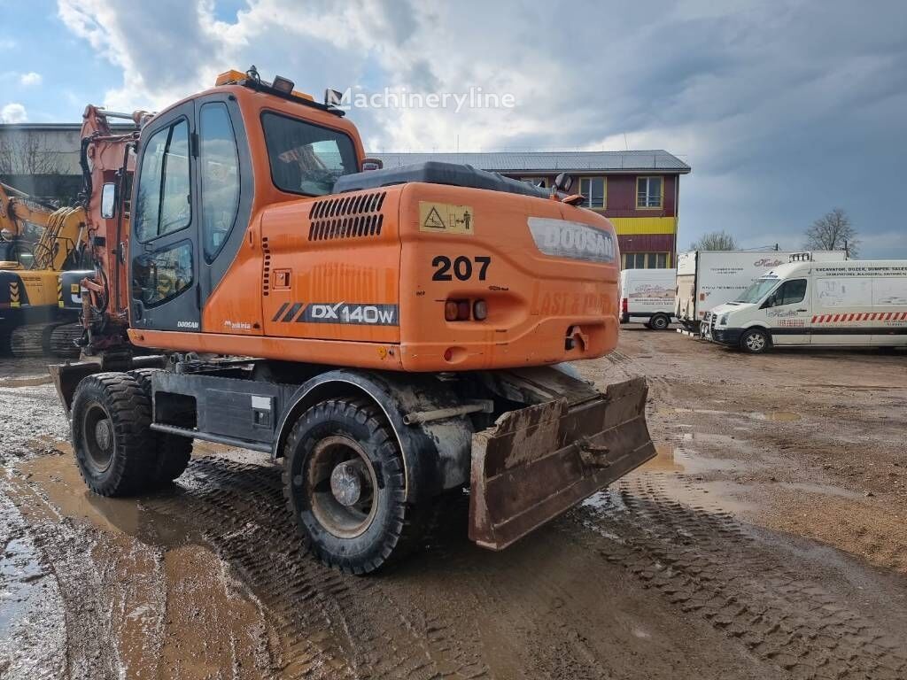 Doosan DX140W + Rototilt bager točkaš