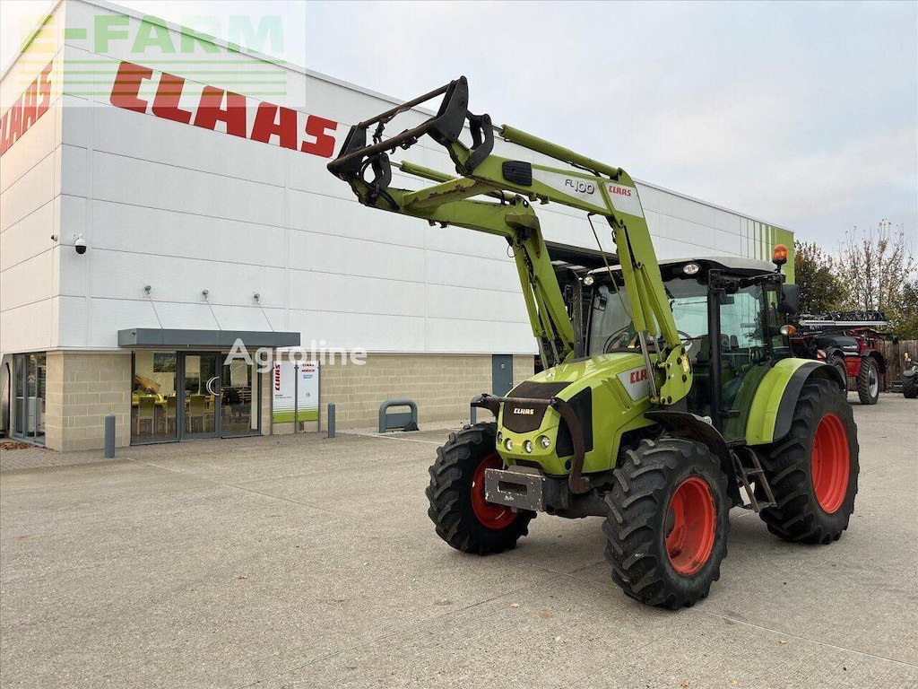 Claas USED 2009 AXOS 330 C/W FL100 C traktor točkaš