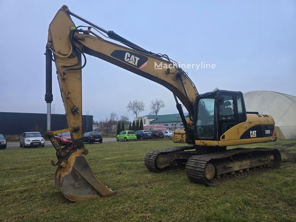 Caterpillar 320D bager guseničar