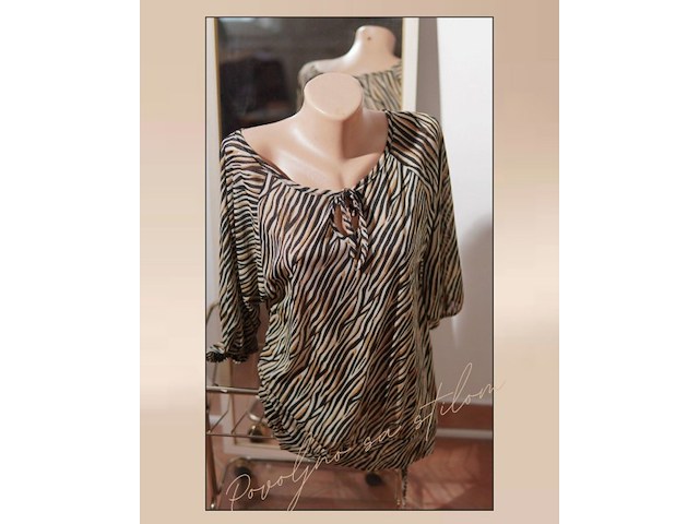3.4. Animal print bluza Okay L