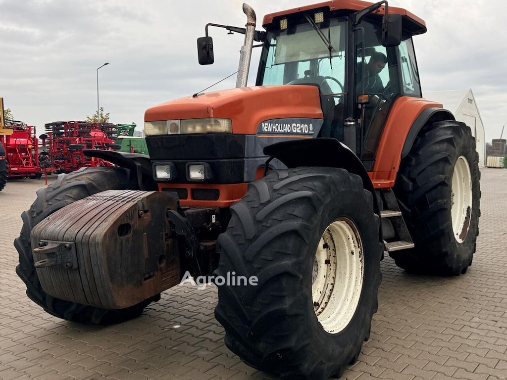 New Holland G 210 traktor točkaš