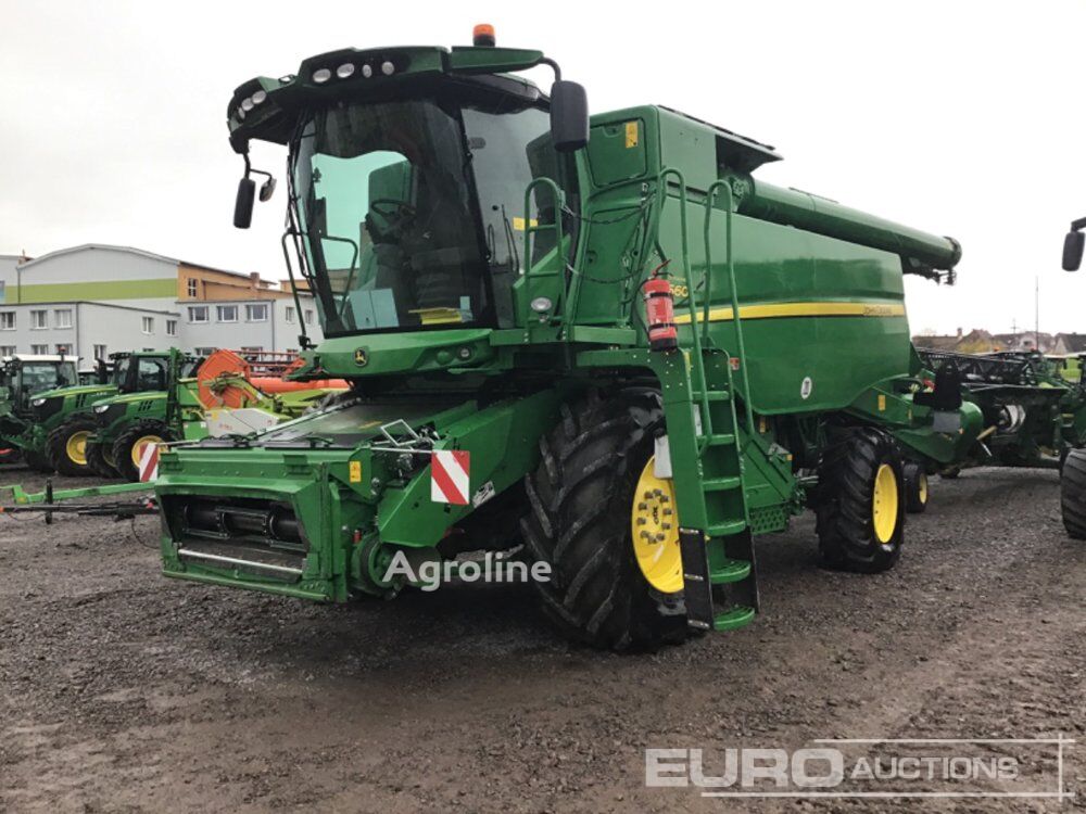 Prodaje se John Deere T670I kombajn za žito na aukciji