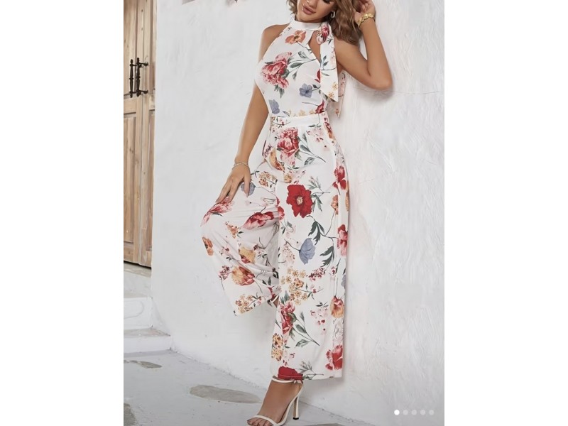 NOV beli cvetni kombinezon vel XS