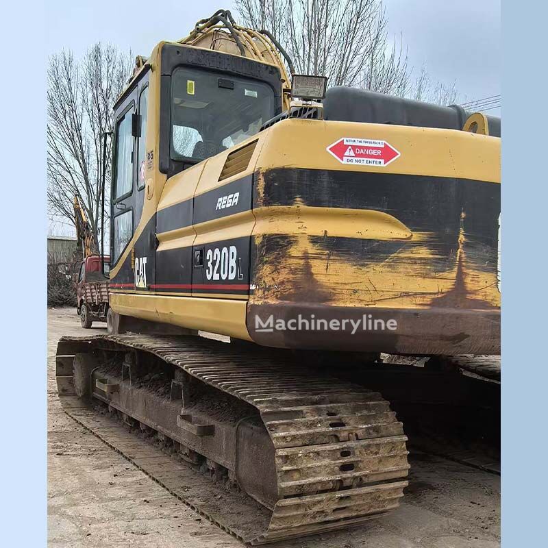 Caterpillar 320BL bager guseničar