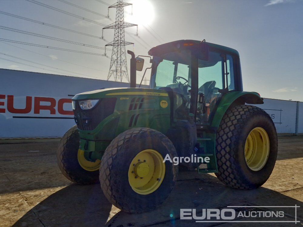 Prodaje se John Deere 6110M traktor točkaš na aukciji