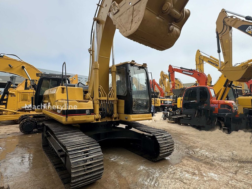 Caterpillar 320BL bager guseničar