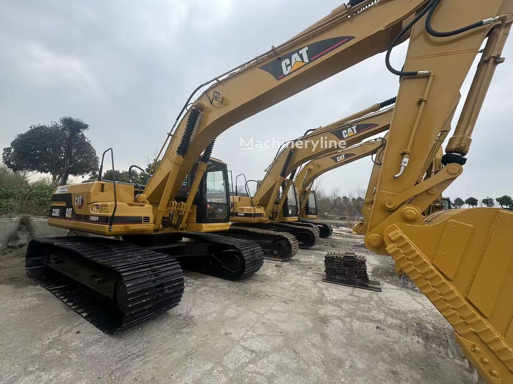 Caterpillar 320BL bager guseničar