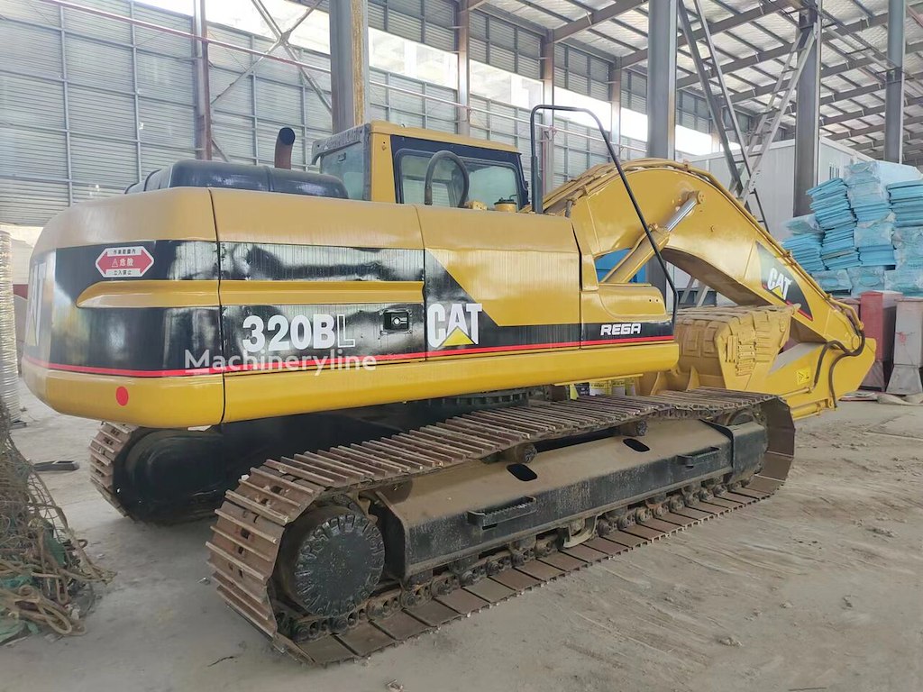 Caterpillar 320BL bager guseničar