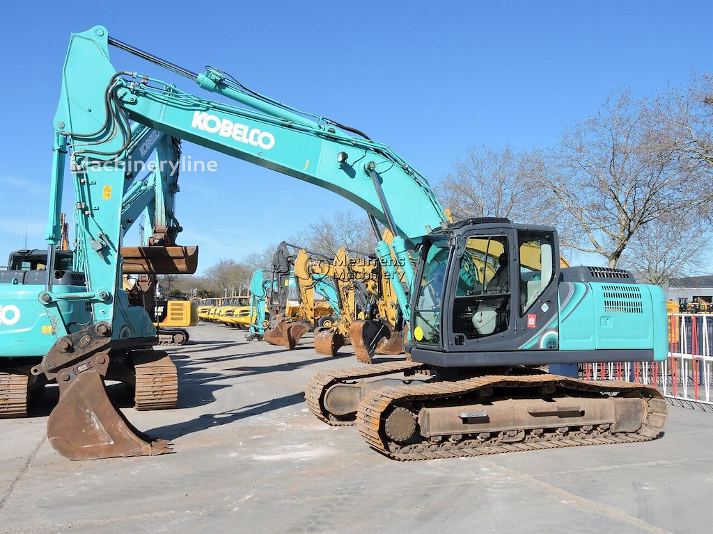 Kobelco SK210 bager guseničar