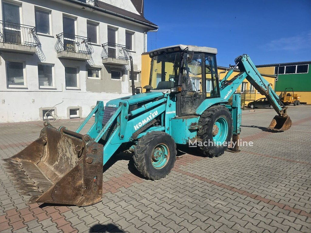 Komatsu 95 bager-utovarivač