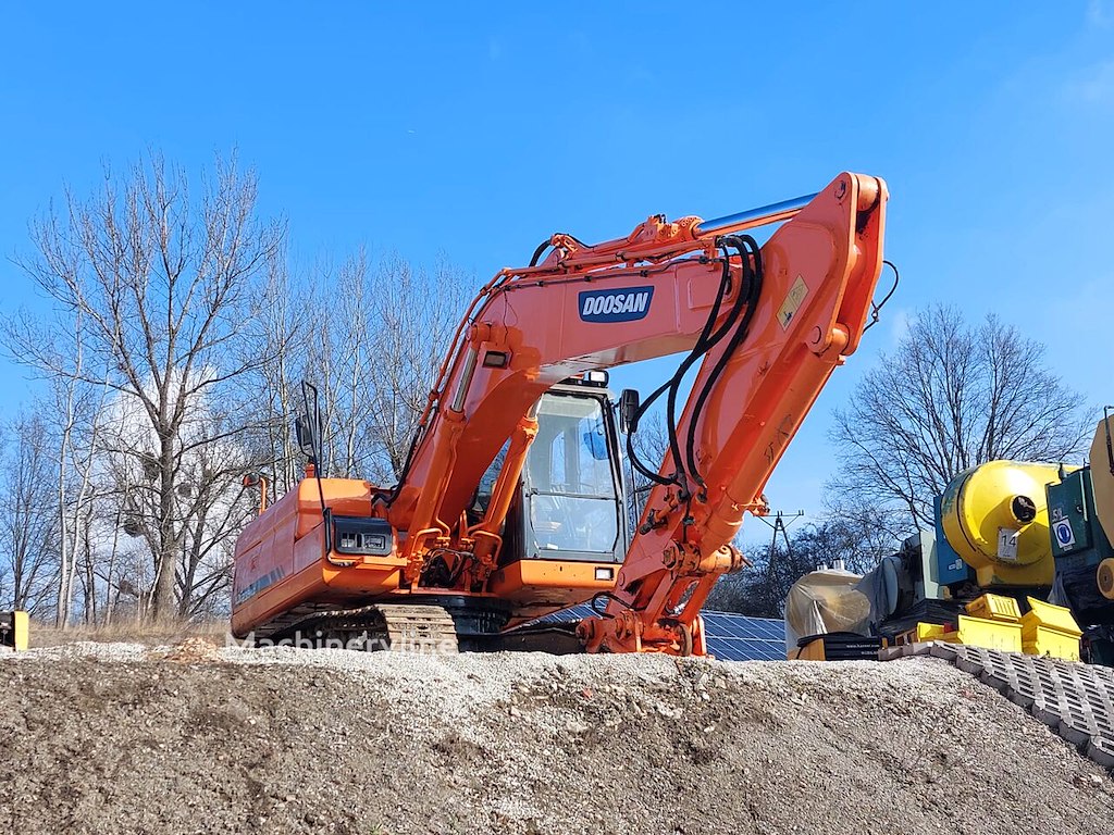 Doosan DX235 bager guseničar