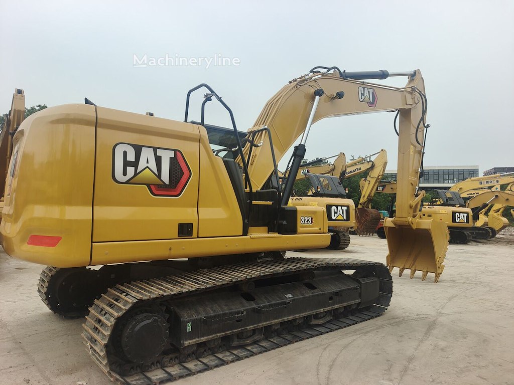 Caterpillar 323 bager guseničar