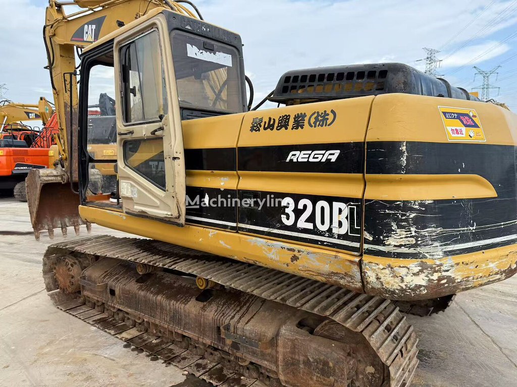 Caterpillar 320BL bager guseničar
