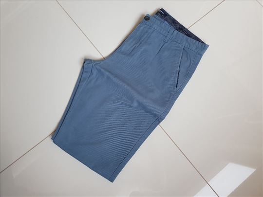 Plave pantalone vel. 34