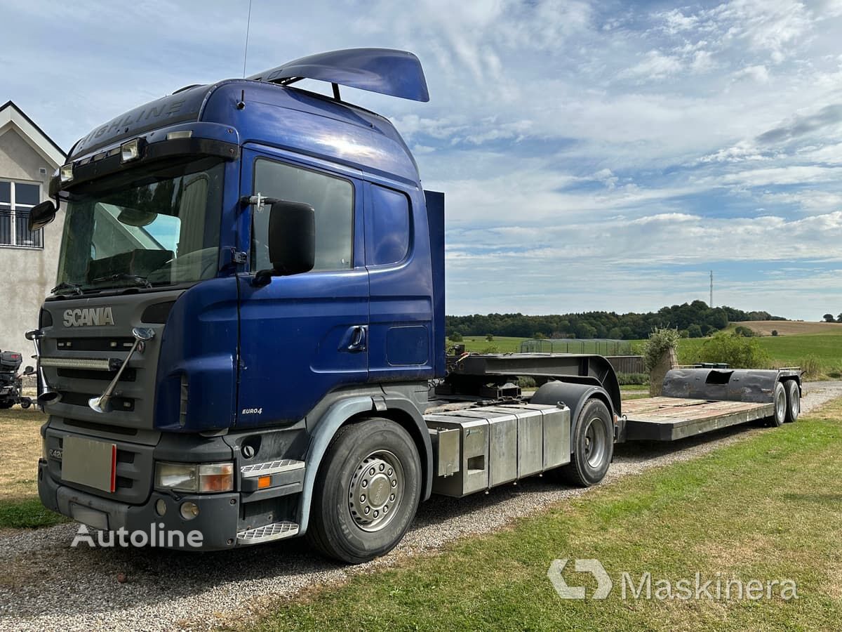 Prodaje se Scania R420 tegljač na aukciji + poluprikolica sa niskom platformom