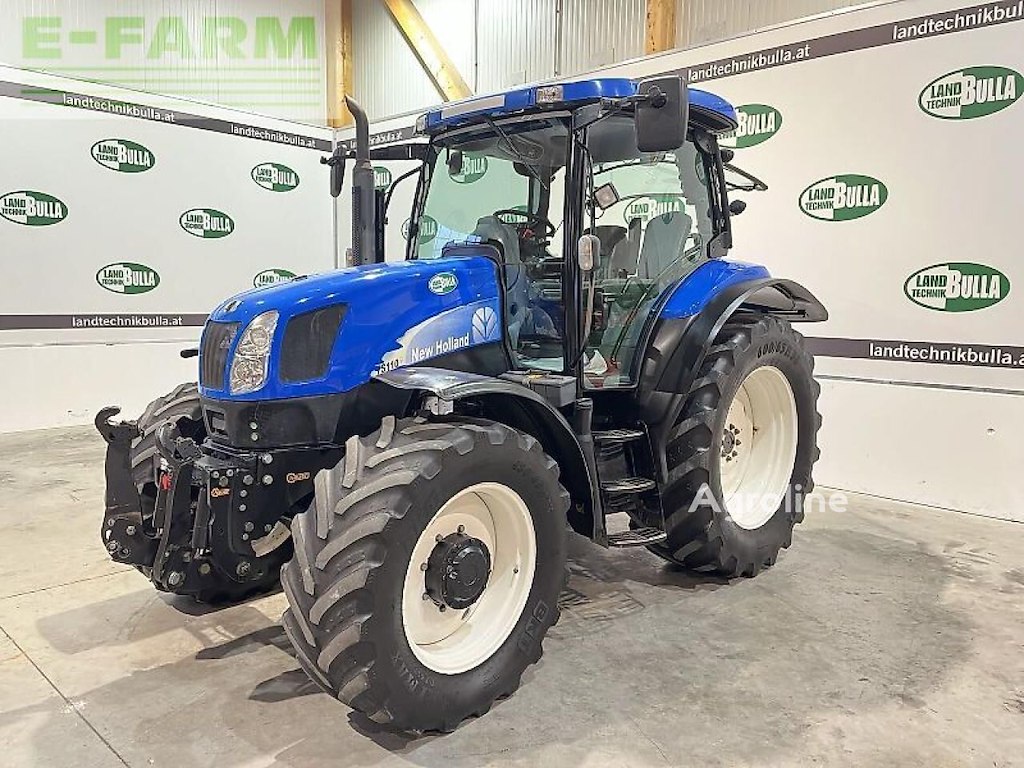 New Holland ts110a plus traktor točkaš