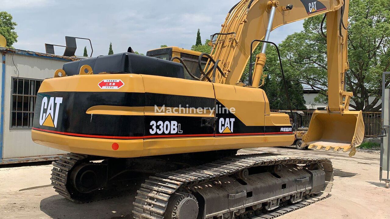Caterpillar 330BL bager guseničar
