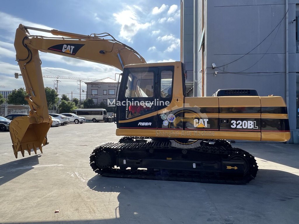 Caterpillar 320BL bager guseničar