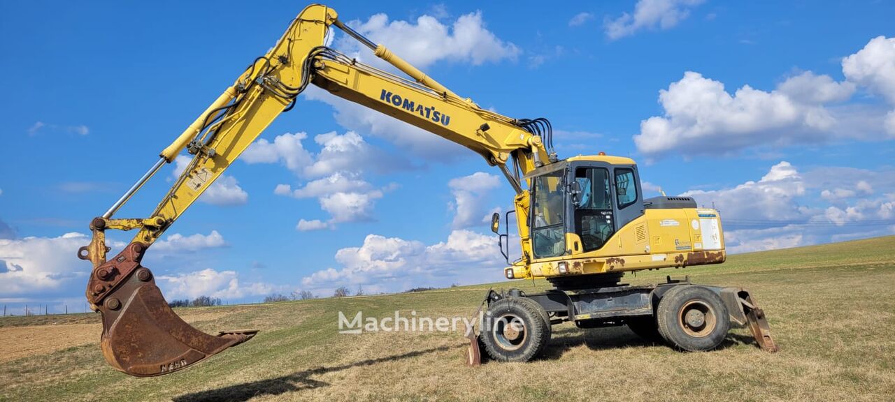 Prodaje se Komatsu PW 220-7 4X4 bager točkaš na aukciji