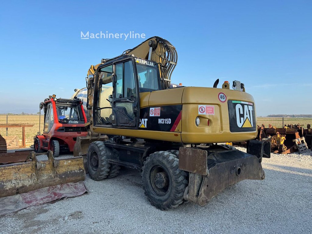 Caterpillar 315D bager točkaš
