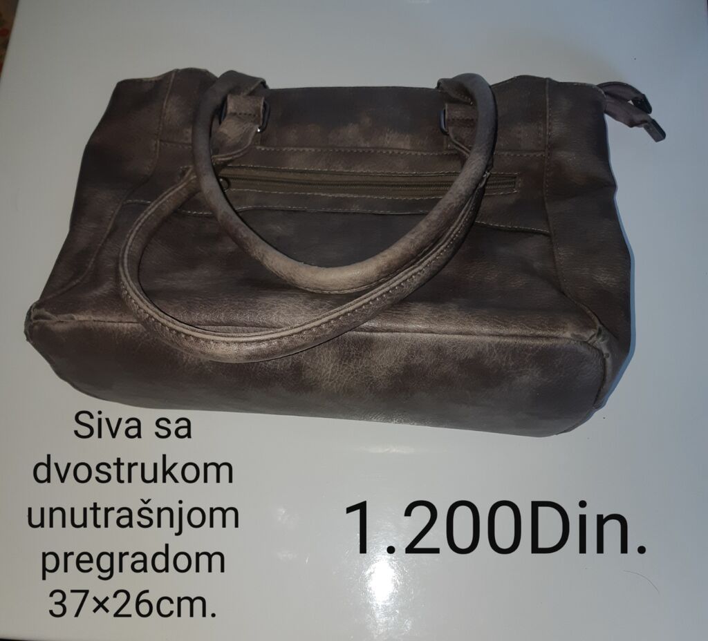 Siva ženska torba, dimenzije 37×26 cm. Dvostruka unutrašnja pregrada
