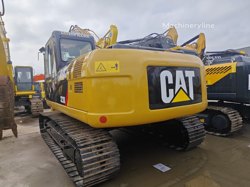 Caterpillar 323D bager guseničar