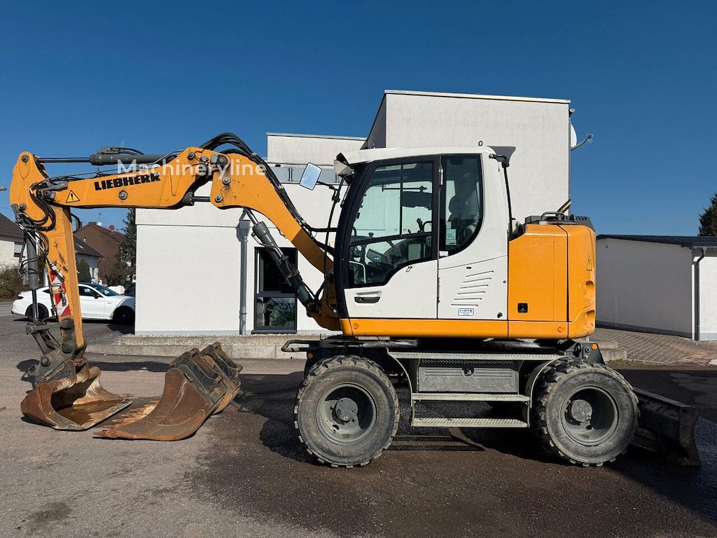 Liebherr A 910 Compact bager točkaš