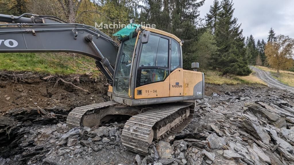 Prodaje se Volvo EC140CL med skuffer og tømmerklo bager guseničar na aukciji