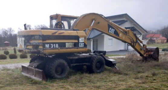 Caterpillar M318 MONOBLOCK bager točkaš
