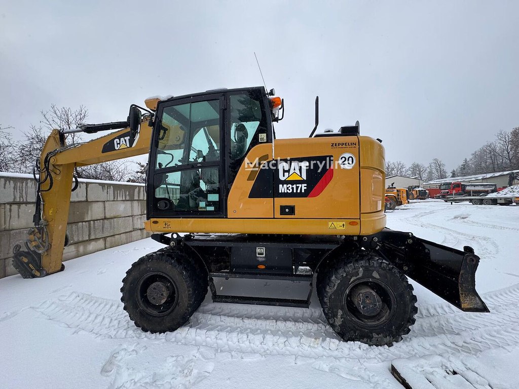 Caterpillar 317 bager točkaš