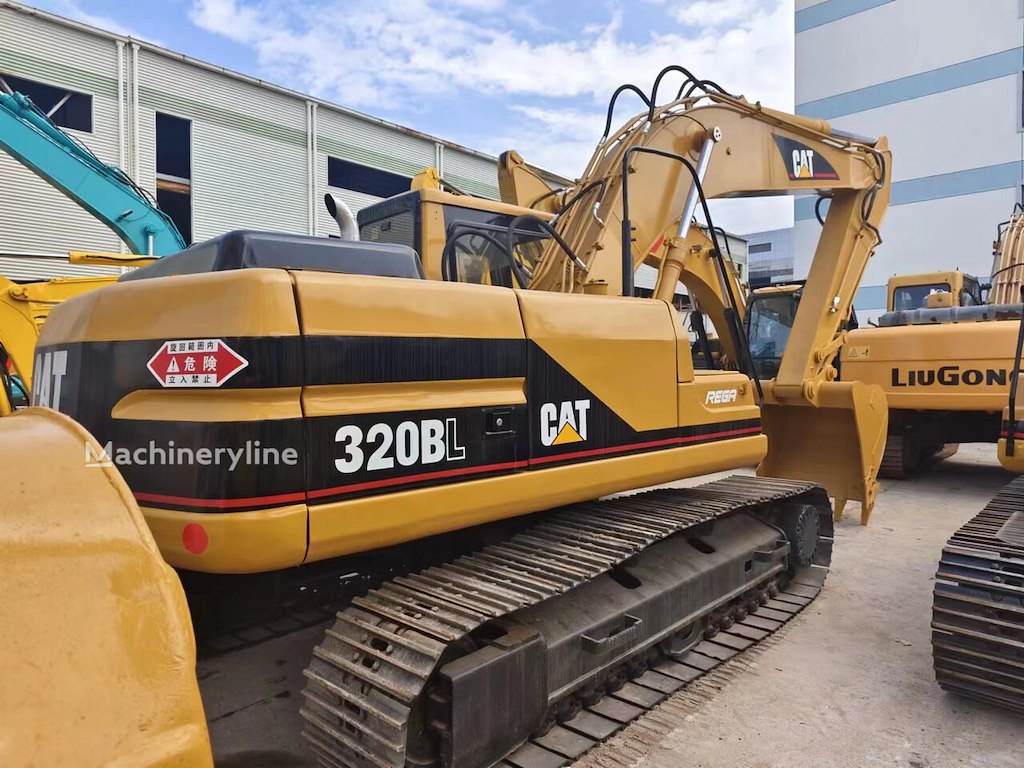 Caterpillar 320BL bager guseničar