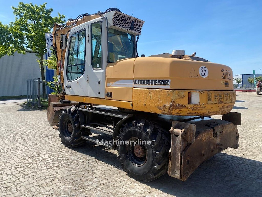 Liebherr A316 Litronic . bager točkaš