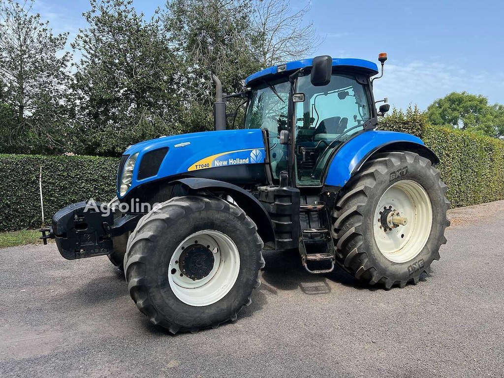 Prodaje se New Holland T7040 4WD SA traktor točkaš na aukciji