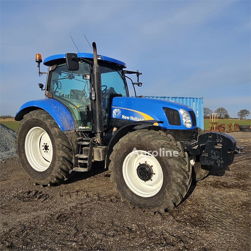 Prodaje se New Holland TS135A PLUS traktor točkaš na aukciji