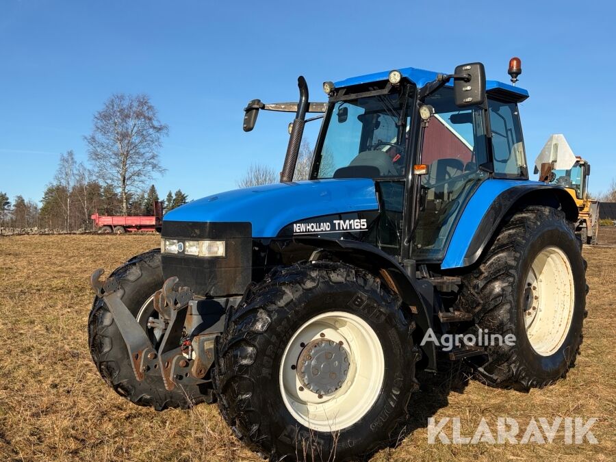 Prodaje se New Holland TM165 traktor točkaš na aukciji