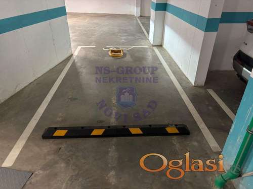 Garažno mesto u suterenu zgrade - 12m2