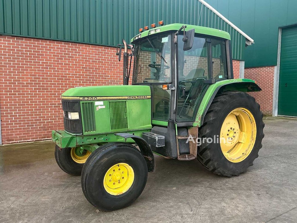 Prodaje se John Deere 6200 traktor točkaš na aukciji
