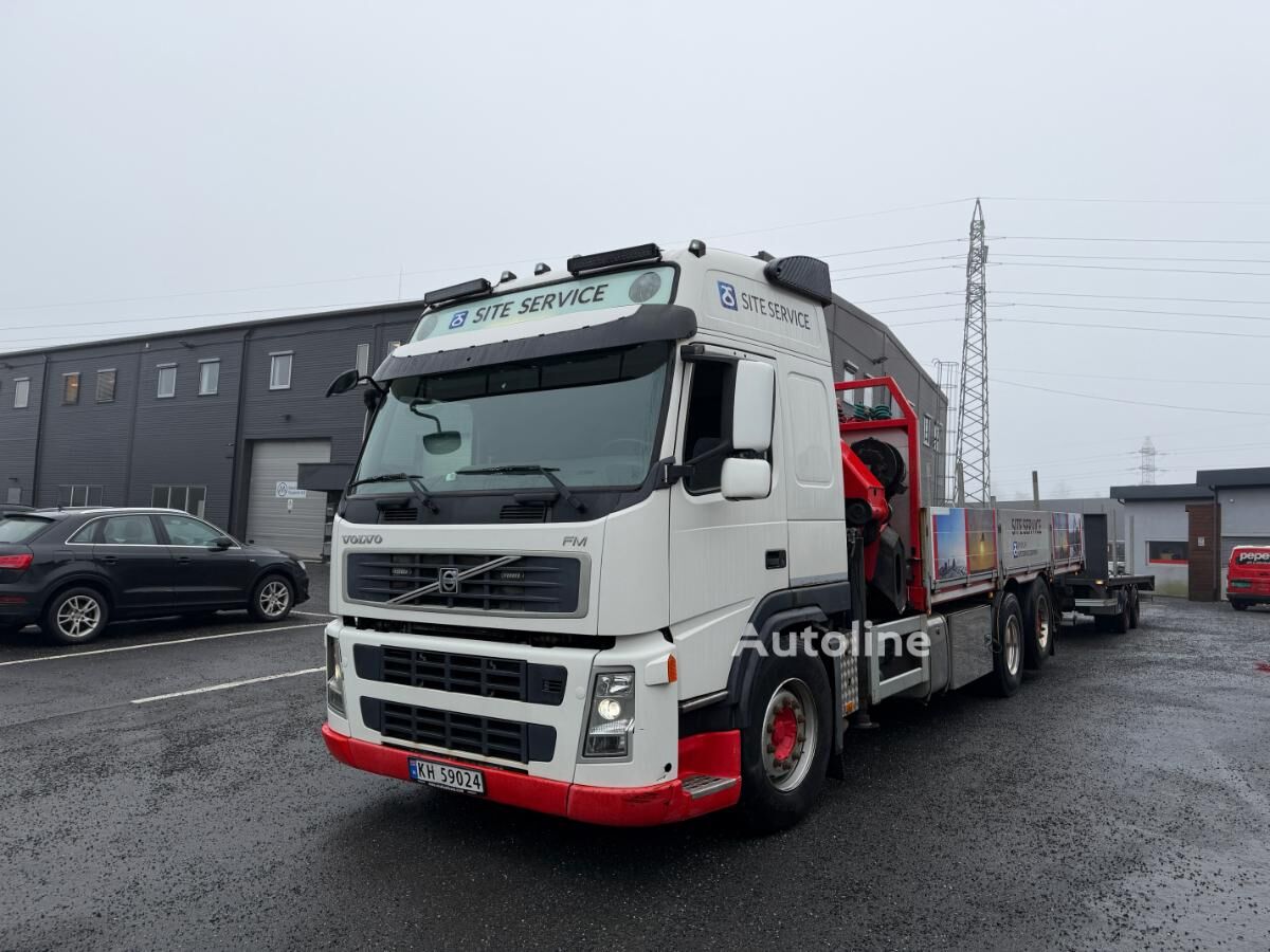 Prodaje se Volvo FM-480 kamion s ravnom platformom na aukciji + prikolica platforma