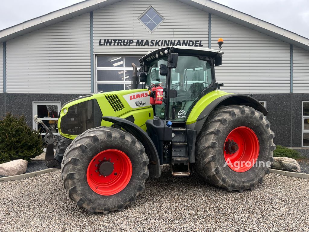 Claas AXION 850 CMatic med frontlift traktor točkaš