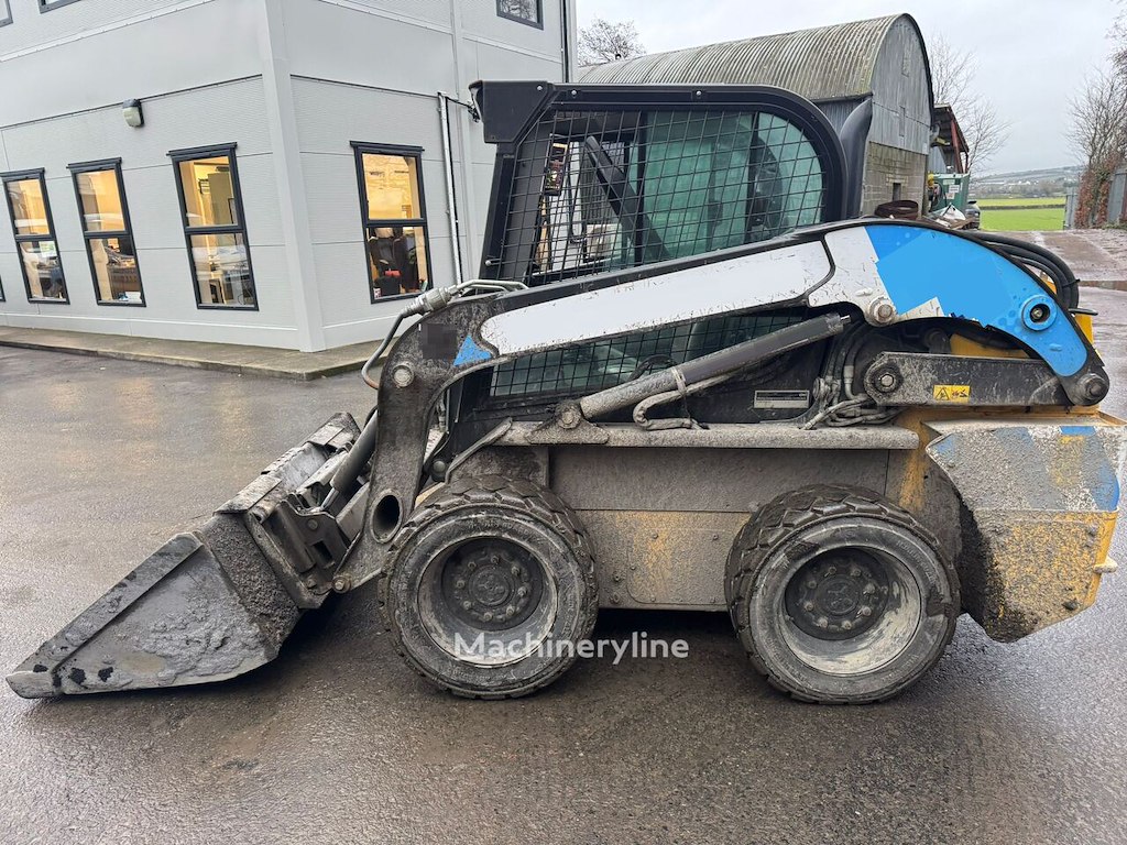 New Holland L318 mini utovarivač
