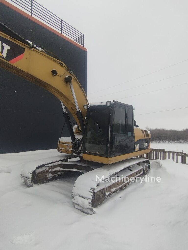 Caterpillar 320DL bager guseničar