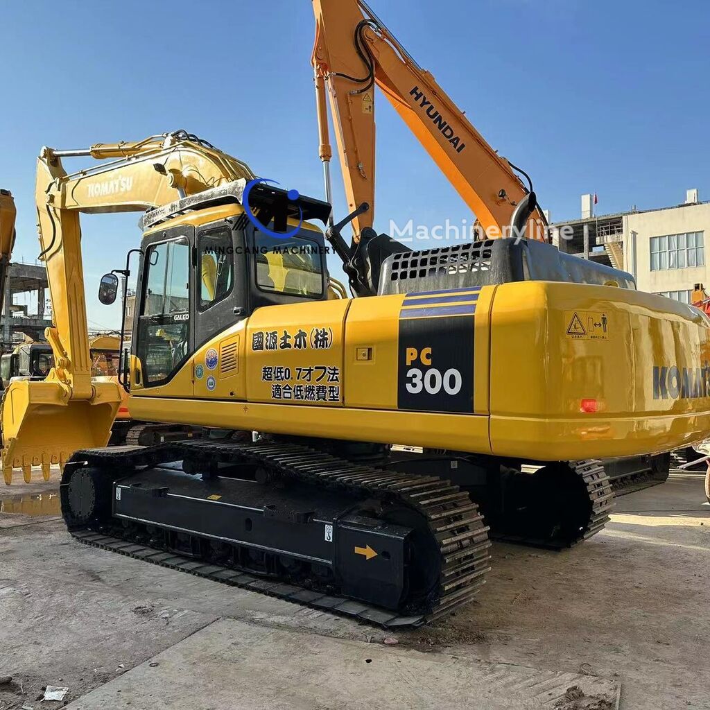 Komatsu PC300 bager guseničar