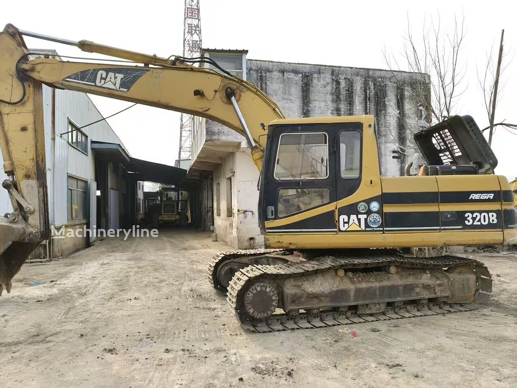 Caterpillar 320BL bager guseničar
