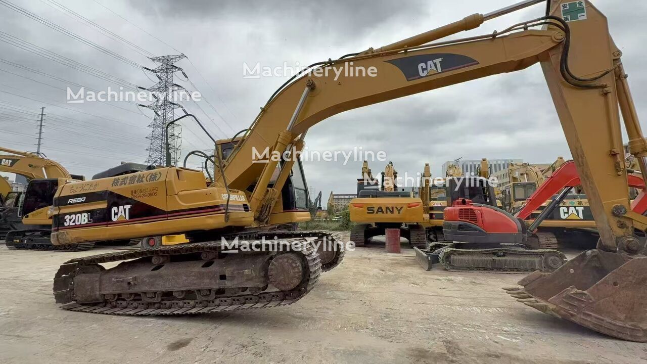 Caterpillar 320BL bager guseničar