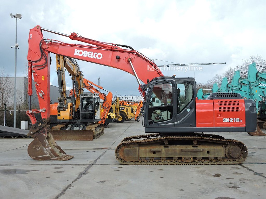 Kobelco SK210 bager guseničar