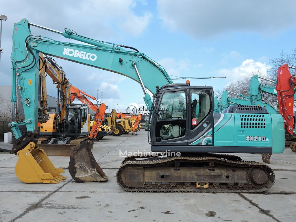 Kobelco SK210 bager guseničar