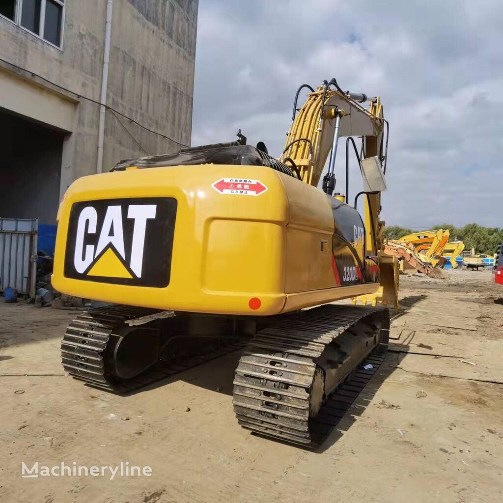 Caterpillar 320DL bager guseničar