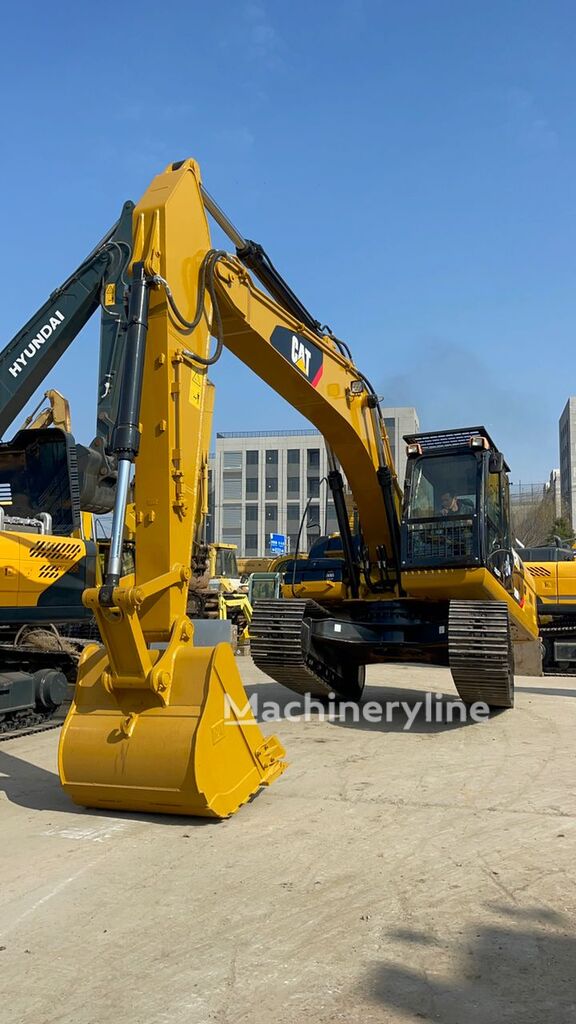 Caterpillar 320DL bager guseničar