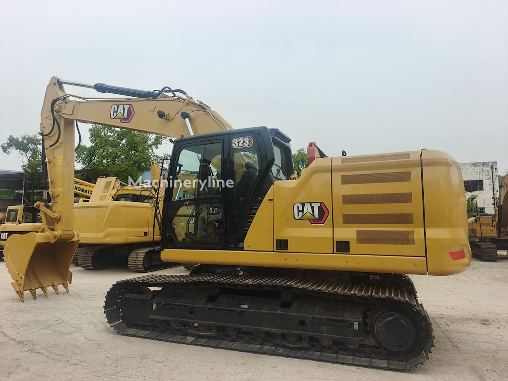 Caterpillar 323 bager guseničar